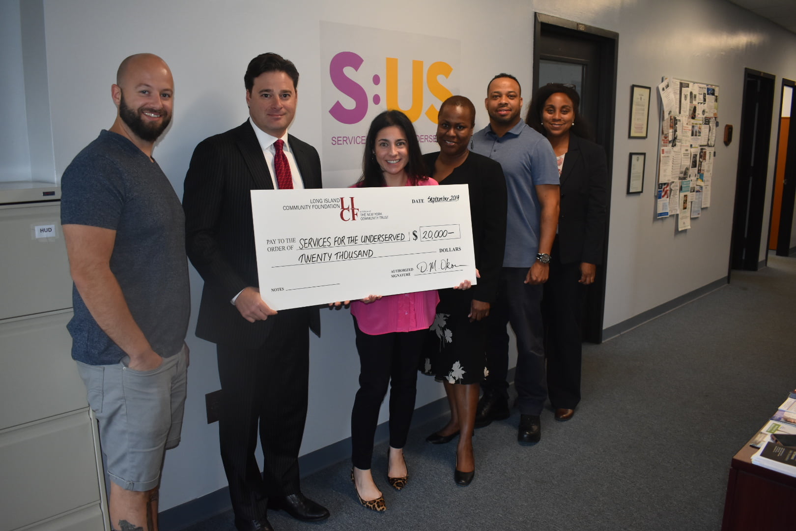 LICF Presents $20,000 to Services for the UnderServed
